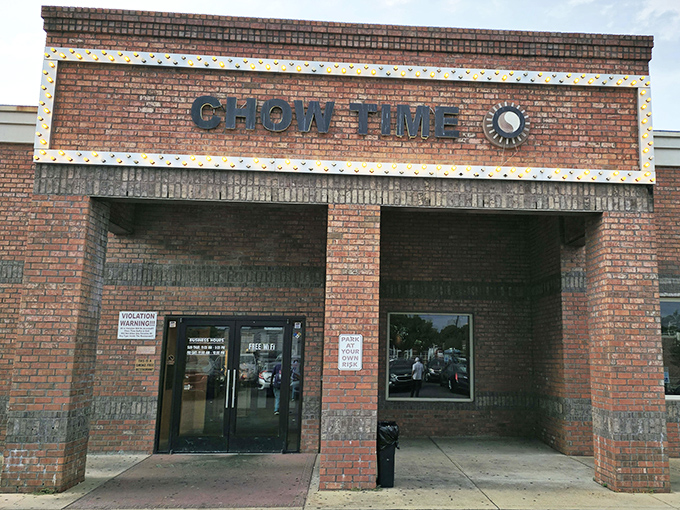 The unassuming brick exterior of Chow Time Buffet & Grill stands like a culinary fortress, promising treasures within that far exceed its modest fa&ccedil;ade.