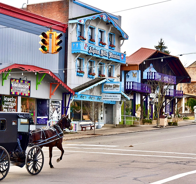 Downtown Sugarcreek's Swiss-inspired architecture creates a storybook setting where horse-drawn buggies still clip-clop past colorful storefronts, making you wonder if your GPS secretly transported you to Europe.