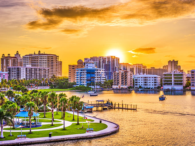 Bradenton's waterfront skyline at sunset looks like Mother Nature decided Florida deserved its own version of golden hour perfection.