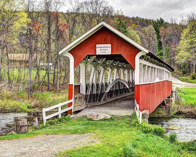 The classic red exterior of Barronvale Bridge stands in perfect contrast to the lush greenery, like a Norman Rockwell painting come to life.