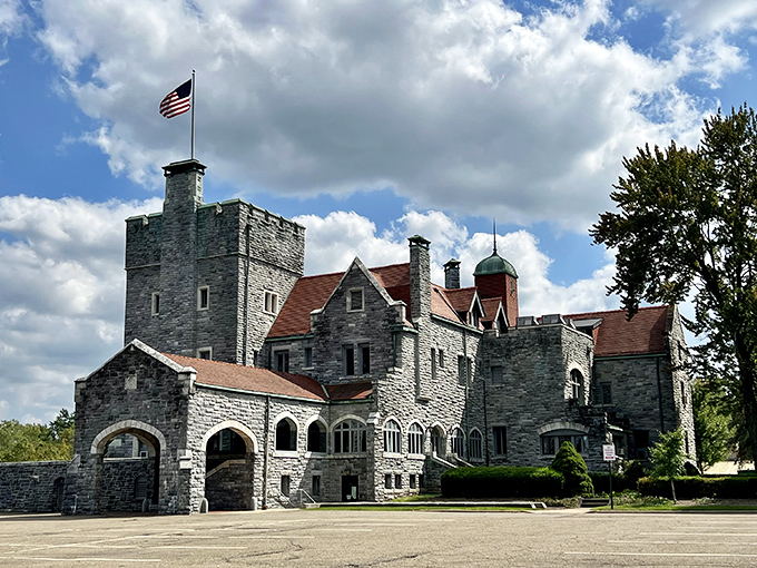 The American flag proudly waves atop this medieval dream in Ohio. Who needs Europe when architectural majesty stands right in Alliance's backyard?