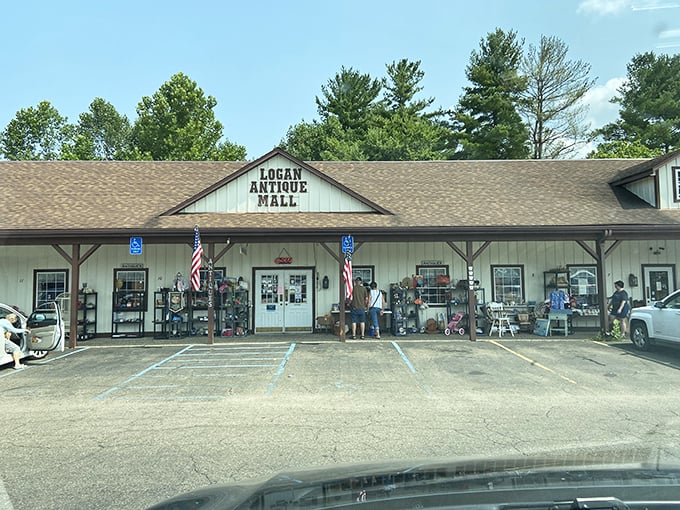 The welcoming exterior promises treasures within, where American flags flutter over displays that hint at countless stories waiting inside.