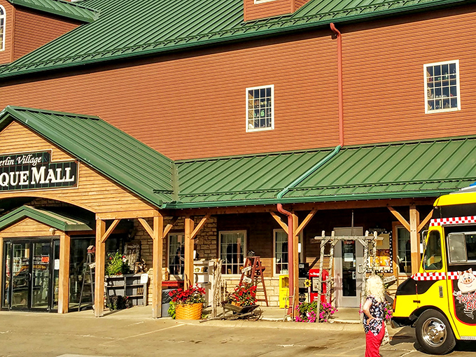 The distinctive red building with its green roof stands like a beacon for treasure hunters in Amish Country. Classic barn-inspired architecture houses countless memories waiting to be rediscovered.