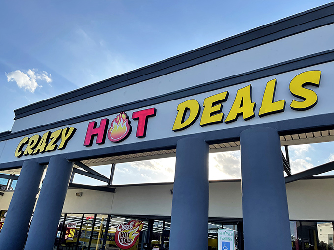 The bright yellow and red signage of Crazy Hot Deals beckons bargain hunters like a retail lighthouse on Westheimer Road.