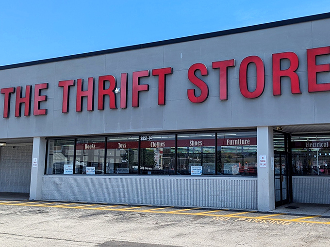 Bold red letters against white brick &ndash; like a no-nonsense invitation to treasure hunting. The straightforward name says it all: adventures await inside.