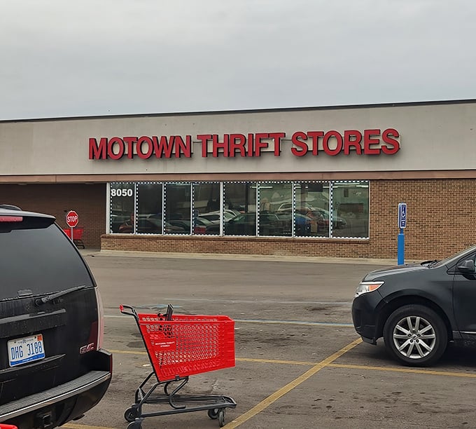 The iconic red Motown Thrift sign beckons bargain hunters like a retail lighthouse, promising treasures within that won't break the bank.