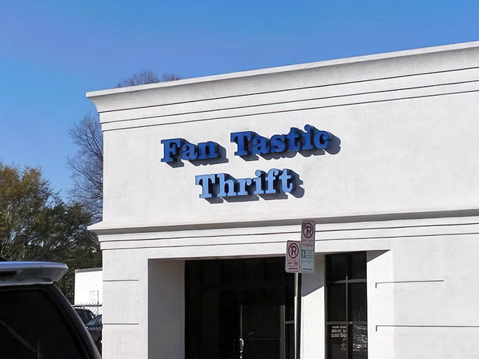 The blue signage against the white building is like a beacon for bargain hunters—Fan Tastic Thrift's exterior promises treasures within for the patient explorer.