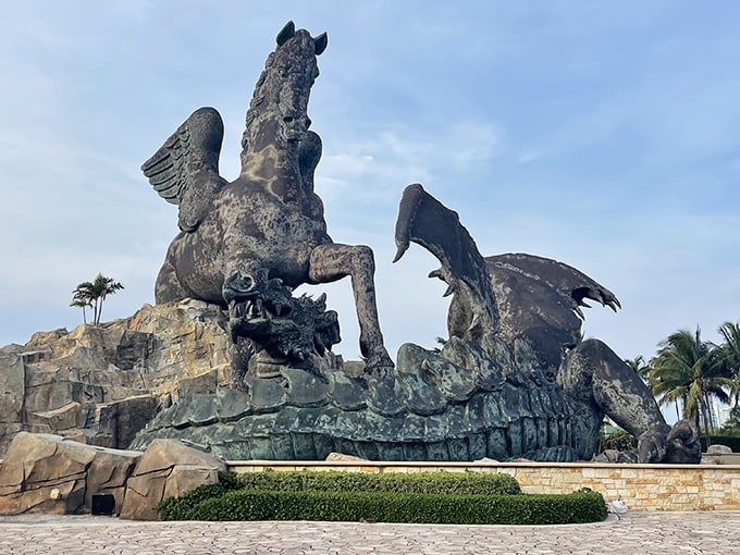 The ultimate mythological showdown! Pegasus and dragon locked in eternal bronze combat, creating Florida's most unexpected roadside photo op.