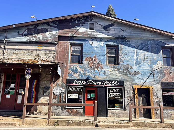 The iconic blue mural adorning the Iron Door Saloon's exterior tells stories of California's wild west days before you even step inside.