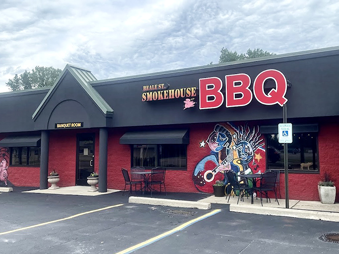 That colorful mural isn't just decoration &ndash; it's a promise of the smoky adventures waiting inside this Fenton barbecue haven.