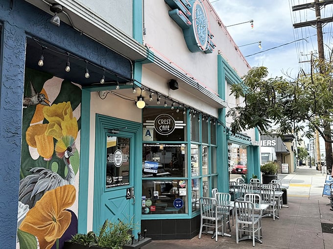 The turquoise trim of Crest Cafe beckon like a culinary lighthouse in San Diego's vibrant Hillcrest neighborhood.