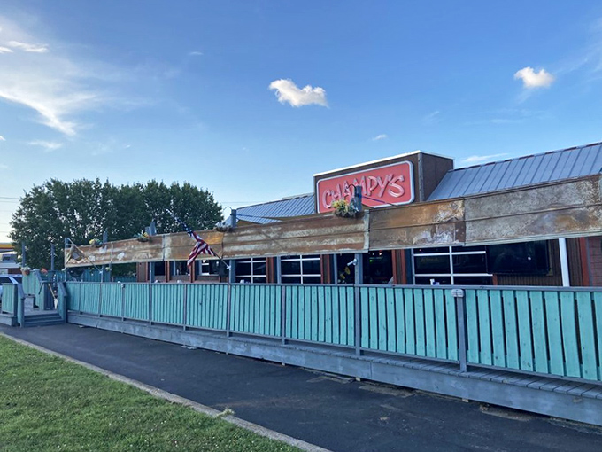 Champy's turquoise fence and welcoming red sign stand like a beacon of comfort food promise in Murfreesboro. Southern hospitality starts at the curb. 