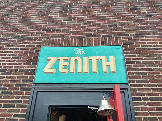 That turquoise sign against brick is like finding a peacock in a hen house&mdash;The Zenith announces itself with mid-century flair that promises something wonderfully different inside.
