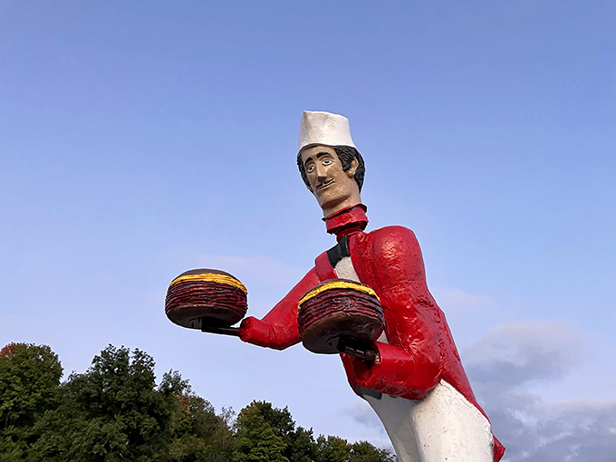 The World's Largest Bobblehead stands tall against Ohio's blue sky, his perpetual nod a silent agreement with your decision to visit.