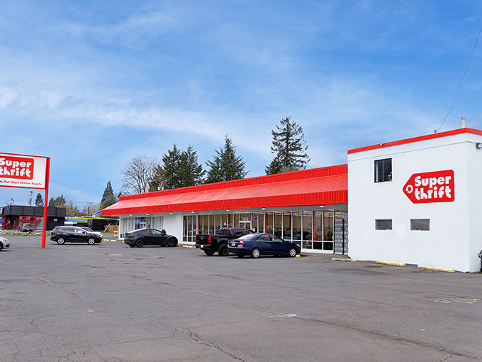 SuperThrift's iconic red roof and signage stand out like a beacon of bargain hope against Portland's sky &ndash; a siren call to thrift enthusiasts everywhere.
