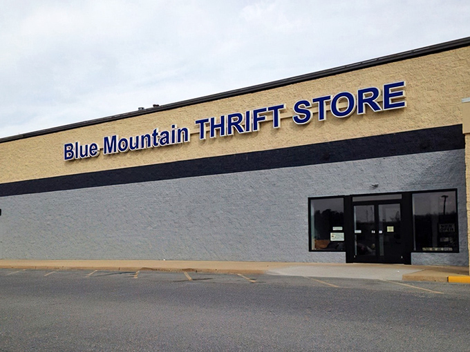 The unassuming exterior of Blue Mountain Thrift Store stands like a treasure chest waiting to be opened. No fancy frills needed when what's inside speaks volumes.