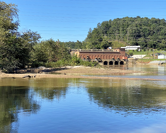 Mirror-like waters reflecting Georgia's soul. The Chattahoochee's gentle curves and scattered boulders create nature's own meditation space.