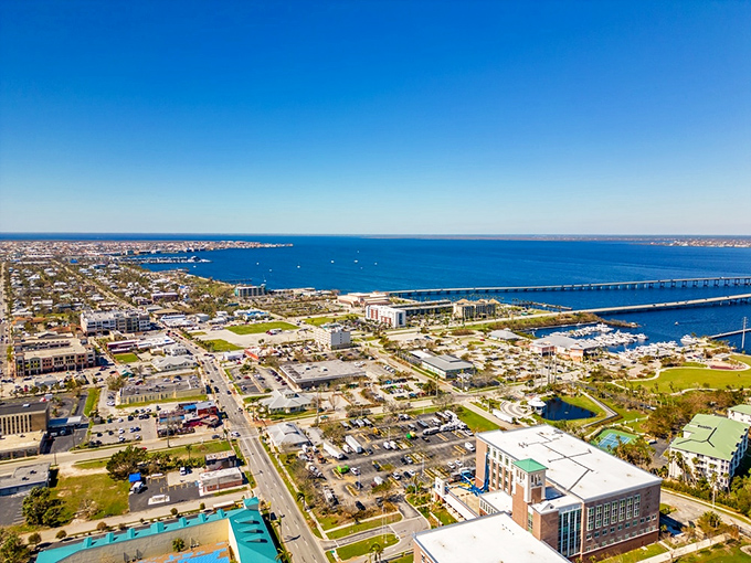Aerial dreams come true! Charlotte Harbor stretches like a blue carpet beneath Punta Gorda's charming grid of streets, promising waterfront living without the South Beach price tag.