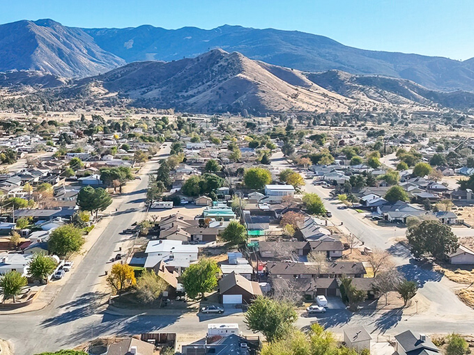 From this bird's-eye view, Lake Isabella spreads like a quilt of modest homes beneath mountains that seem to say, "Yes, this is still California, just without the hefty price tag."