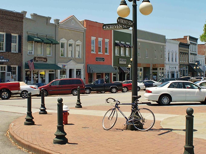 Front Street's colorful storefronts stand like a lineup of Southern charm contestants, each one vying for the "Most Likely to Make You Want to Move Here" award.