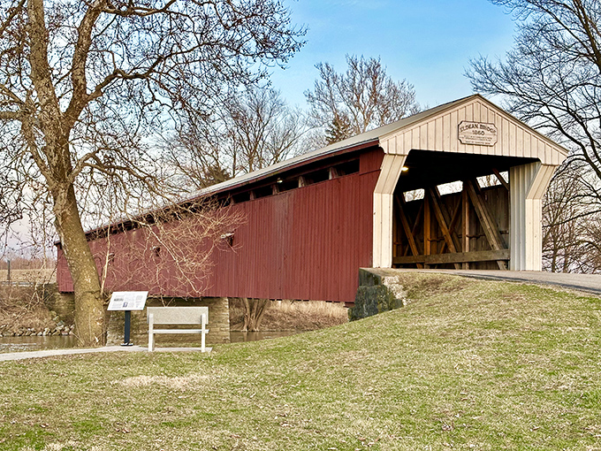 The classic red siding and white-trimmed portals of the Eldean Bridge create that perfect "you've arrived somewhere special" moment as you approach this 1860 treasure.