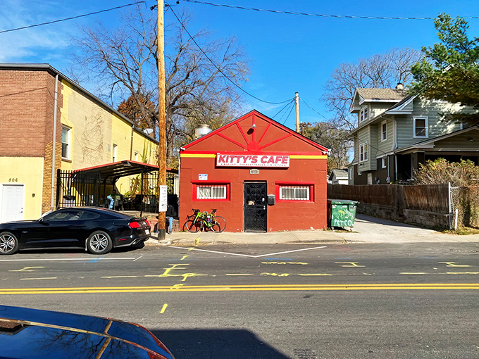 The little red building that could! Kitty's Cafe stands proudly on 31st Street, a humble architectural statement making bold culinary promises.