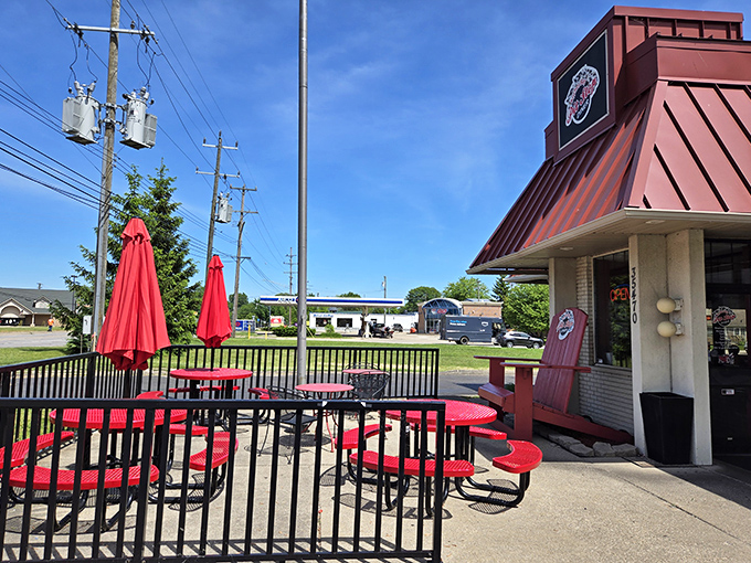 That iconic red roof isn't just architectural flair—it's a beacon calling to hungry travelers like a lighthouse for empty stomachs.