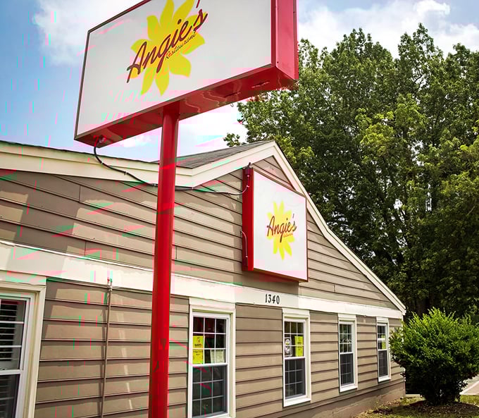 The sunshine-yellow logo beckons like a breakfast beacon. Angie's modest exterior hides culinary treasures that locals have been keeping secret for too long.