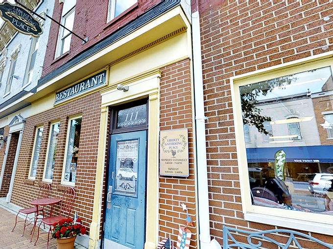 The iconic blue door with yellow trim welcomes you to Liberty Gathering Place, where small-town charm meets big-time flavor in West Liberty, Ohio.