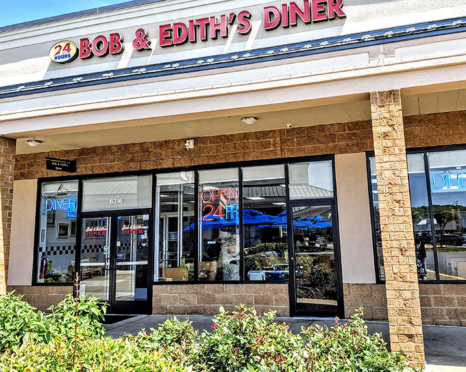 The iconic red signage of Bob & Edith's Diner promises 24-hour comfort in Springfield. Like a lighthouse for the hungry, it beckons with the promise of classic American fare.