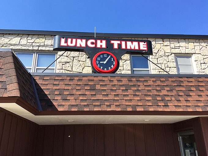 The unassuming exterior of Kroll's East stands as a beacon to hungry travelers. When that "LUNCH TIME" sign calls, Wisconsin answers.