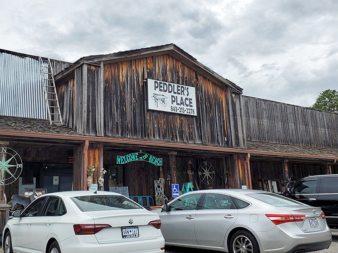 The weathered wooden facade of Peddler's Place isn't just rustic charm&mdash;it's a warning sign that your wallet is about to experience a joyful lightening.