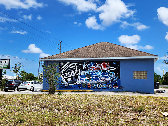 The bright blue exterior of Gear Up Surplus stands out against Florida's sky like a military-grade beacon for bargain hunters and adventure seekers alike.