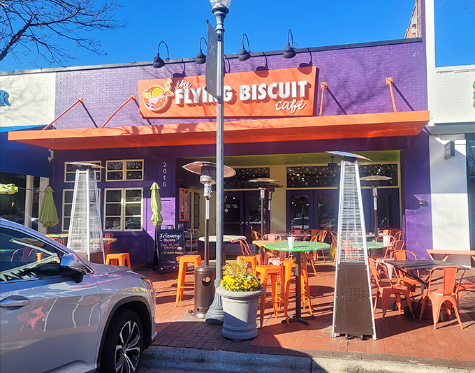 The purple building with its vibrant orange awning isn't just a restaurant&mdash;it's a morning beacon calling breakfast enthusiasts home.
