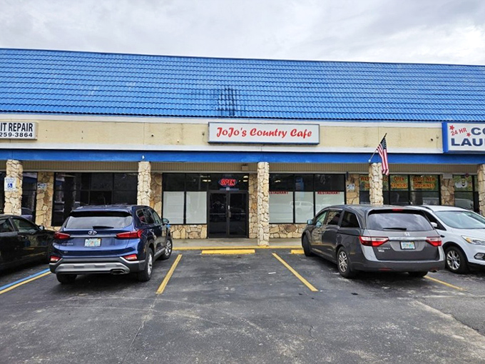 The iconic blue roof of JoJo's Country Cafe stands out in Deltona like a beacon for hungry souls seeking comfort food salvation.