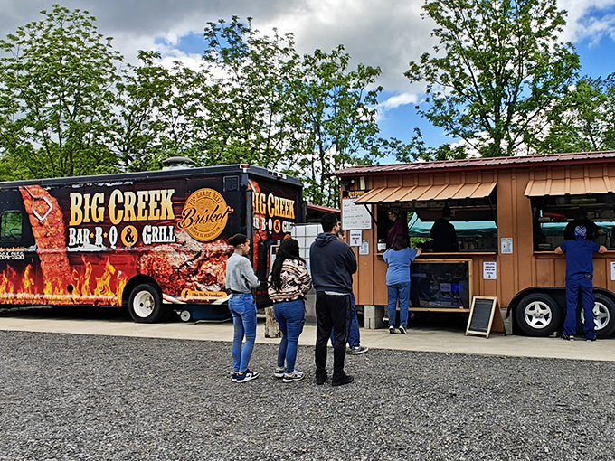 The Big Creek Bar-B-Q bus isn't subtle about its mission - it's a flame-wrapped barbecue battleship ready to launch a full-scale assault on your hunger.