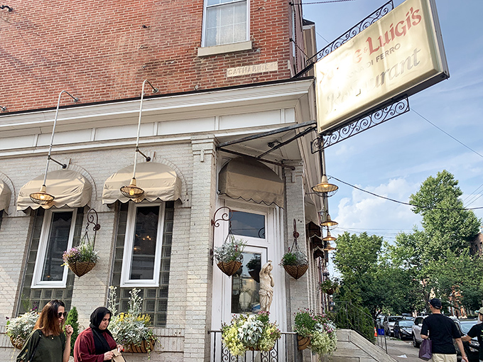 The classic white brick fa&ccedil;ade and yellow "Dante & Luigi's" sign have welcomed hungry Philadelphians for generations, promising Italian comfort within.
