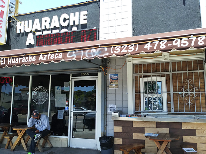 The unassuming storefront of El Huarache Azteca beckons from York Boulevard, promising authentic flavors behind its modest exterior.