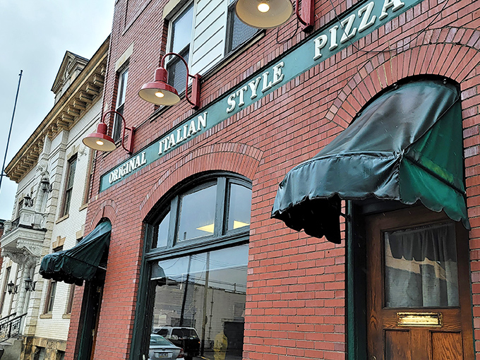 The iconic brick facade of Police Station Pizza stands as a testament to pizza history in Ambridge &ndash; simplicity and tradition in architectural form.