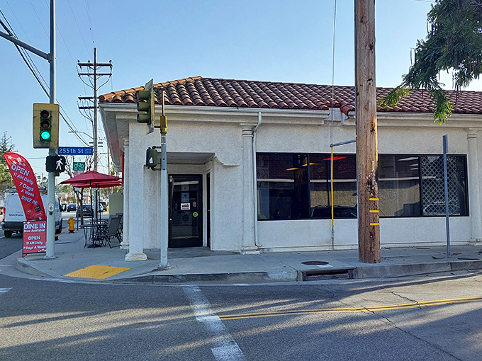 The unassuming exterior of Harry's might not stop traffic, but the heavenly BBQ aromas wafting from this corner spot certainly will. Culinary treasures often hide in plain sight.