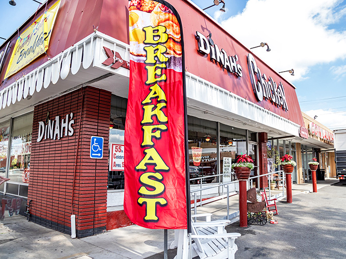 That iconic red exterior isn't just a building&mdash;it's a beacon of hope for the hungry. The "BREAKFAST" banner promises salvation at any hour.