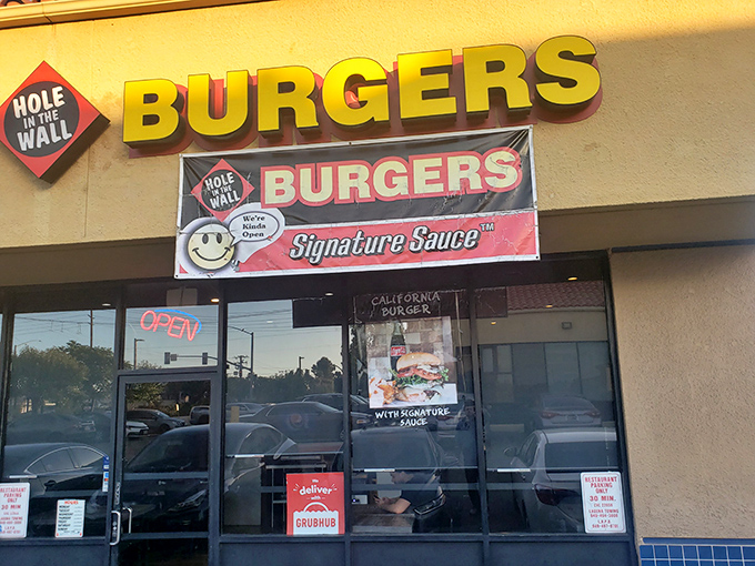 The unassuming storefront that houses burger greatness. Like finding a diamond in a strip mall, Hole in the Wall Burger's exterior promises simple pleasures done right.