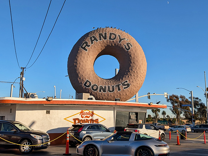 The iconic 32-foot donut beckons from the Inglewood skyline like a sugary lighthouse guiding hungry travelers home. A true California landmark!