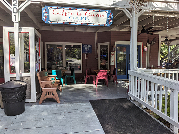 The front porch of Coffee n' Cream beckons like an old friend, with colorful chairs practically whispering, "Sit a spell, won't you?"