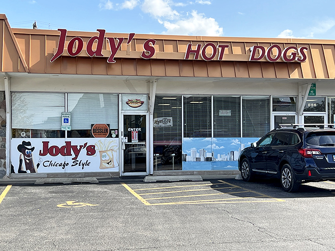 That storefront sign isn't whispering sweet nothings &ndash; it's shouting "hot dog heaven" to anyone with taste buds.