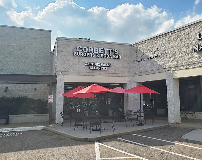 Unassuming strip mall treasure with bright red umbrellas beckoning you in&mdash;proof that culinary gems often hide in plain sight.