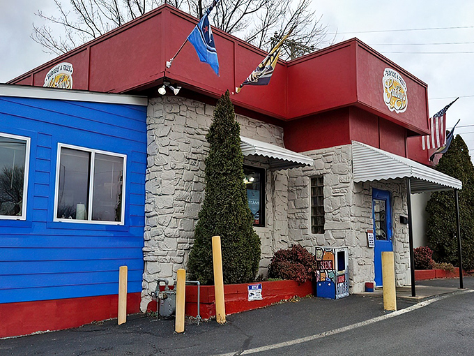 The patriotic red, white, and blue exterior isn't just eye-catching—it's a beacon for burger lovers seeking salvation from mediocre fast food chains.