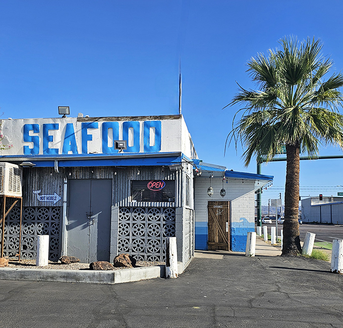 The unassuming blue facade of Knock Kneed Lobster stands like a mirage in the desert&mdash;proof that great seafood doesn't need ocean views to be spectacular.