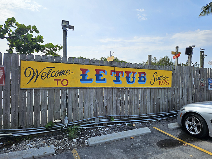 That weathered yellow sign isn't just welcoming you&mdash;it's practically begging you to discover Florida's best-kept seafood secret.