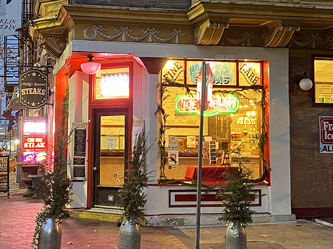 Those neon signs and vintage charm make every evening stroll feel like stepping into a classic movie scene.